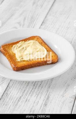 Sweet butter toast on the white plate Stock Photo - Alamy