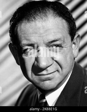 Actor Sid James in film Upstairs and Downstairs 1959 Stock Photo - Alamy