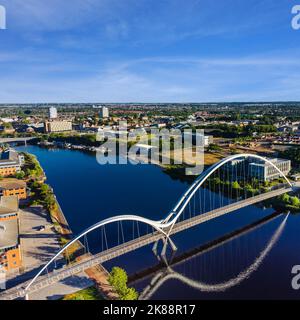 Aerial view of the Infinity Bridge spanning the river Tees located in ...