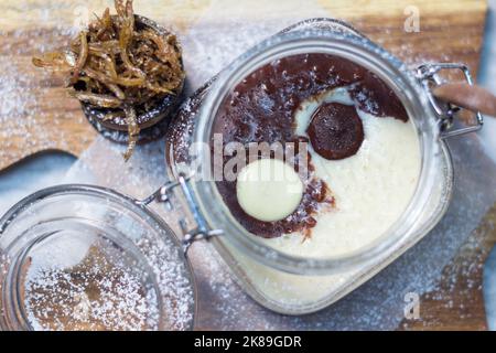 Popular Filipino comfort food, chocolate champorado with dried fish at ...