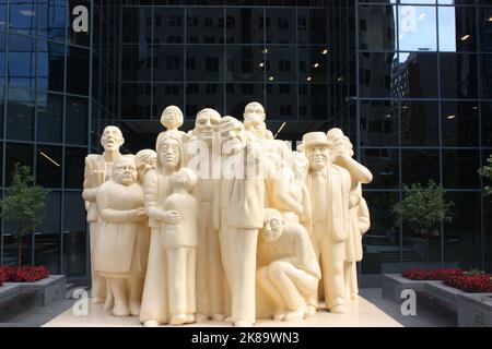 The sculpture Illuminated Crowd outside the Fiera Capital building in ...