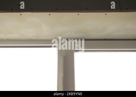 windows with plasterboard slopes, moisture and fungus, apartment ...