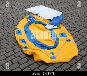 Deflated rubber dinghy in Blue Lagoon, Saint Vincent, Saint Vincent and ...