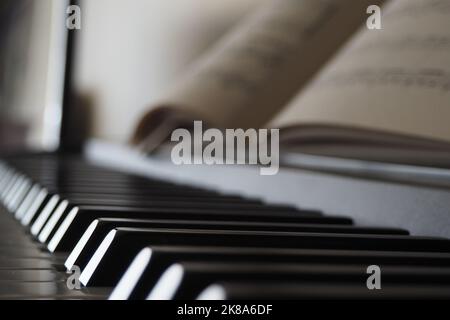 Detail of keys on a piano ready for music concert. Closeup standard ...