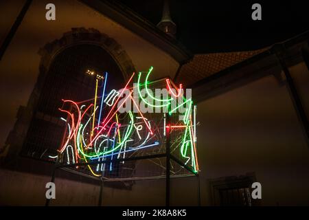 Neon light installation iside building in Prague Stock Photo - Alamy