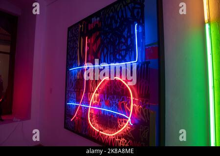 Neon light installation iside building in Prague Stock Photo - Alamy