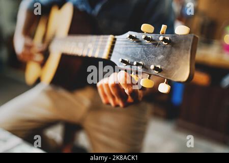 A shallow focus shot of a person playing an electric guitar Stock Photo ...