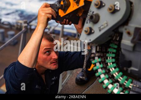 Fire Controlman 2nd Class Eric Matthews, assigned to the Arleigh Burke ...