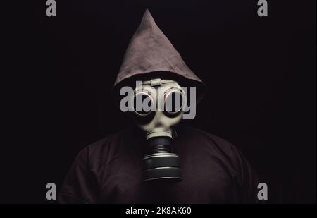 Creepy monster wearing scary mask with fake blood and stringy hair ...