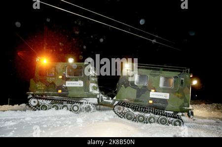 Electrician from Vattenfall at work during a snowstorm, Östergötland ...