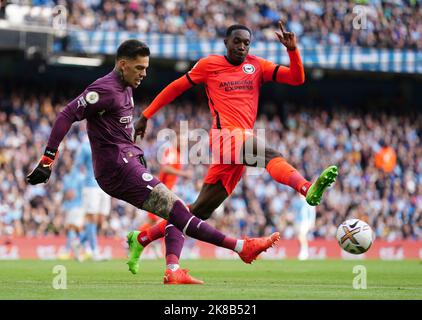 Manchester City goalkeeper Ederson clears a flare of the pitch after ...