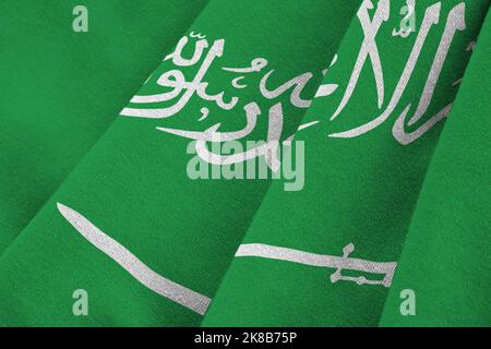 Saudi Arabia flag with big folds waving close up under the studio light ...