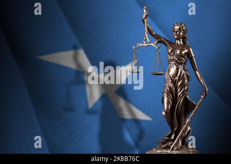 Somalia flag with statue of lady justice, constitution and judge hammer ...