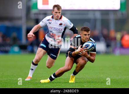 Exeter Chiefs' Henry Slade (right) is tackled by Gloucester's Seb ...
