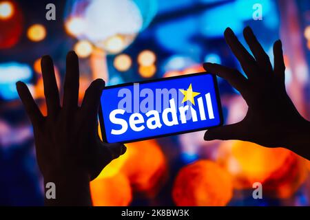 In this photo illustration, the Seadrill logo is displayed on a ...