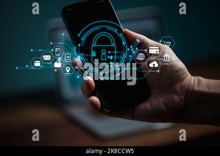 A businessman protecting data personal information on tablet and ...