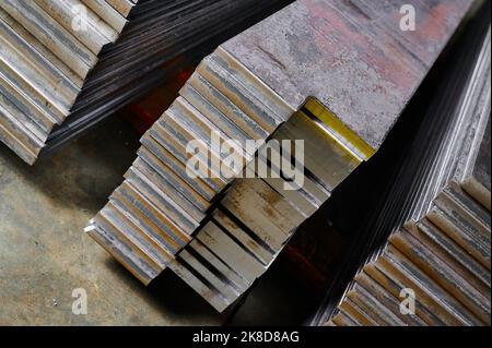 Stacks of details with ground edges and corners on floor Stock Photo ...