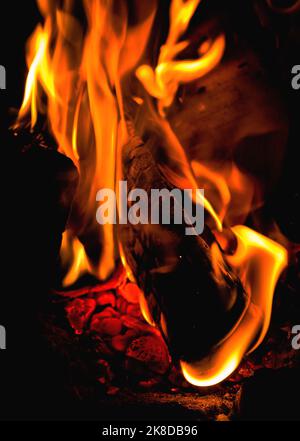 burning fire wood fuelwood closeup Stock Photo - Alamy
