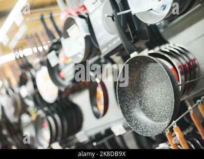 frying pans at sale, shallow dof Stock Photo - Alamy