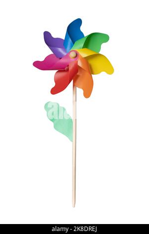 Colorful rainbow pinwheel wind spinner with polka dot pattern on a ...