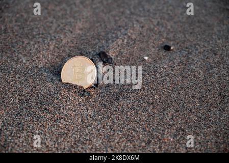 Bitcoin Coin Lies In Sand On Beach On Sunset Moraitika, Corfu, Greece ...