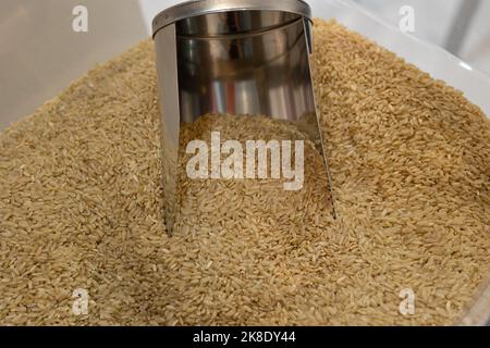 Black Uncooked Rice inside Big Bowl and metallic Spoon Stock Photo - Alamy