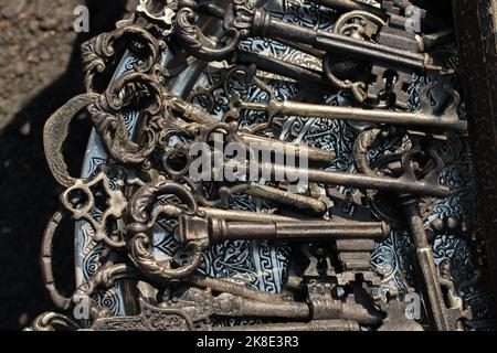 Retro styled color decorativel key made of metal Stock Photo - Alamy