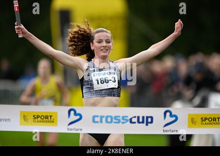 Belgian Lisa Rooms celebrates as she crosses the finish line at the ...