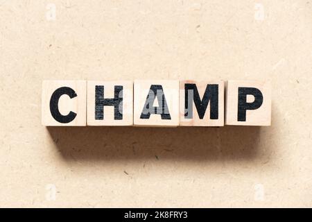 Alphabet letter in word champ on old red color wood plate background ...
