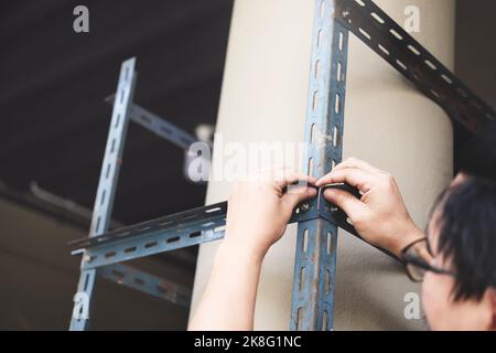 do it yourself concept, Craftsmen to assemble old iron parts. Make a ...