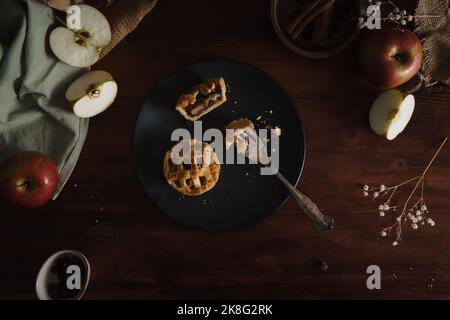 Mini Apple Pie Tarts in dark style food image Stock Photo - Alamy