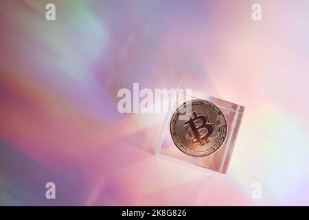 Golden bitcoin coins on holographic, abstract, neon background. digital ...