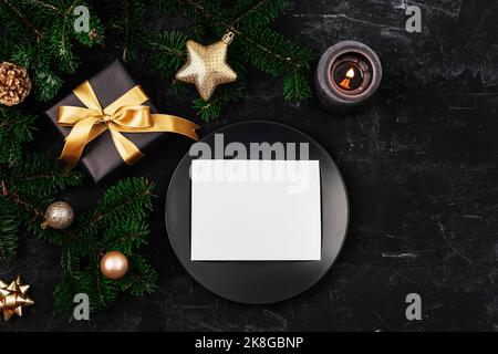 Stylish table setting with blank card and floral decor on white ...