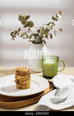 Plate with stack of tasty biscuits placed on table Stock Photo - Alamy