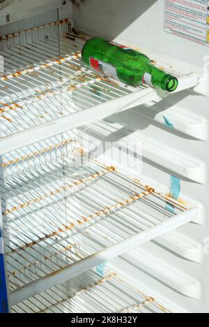 Empty bottle of Bintang beer in an empty fridge, Bali, Indonesia Stock ...