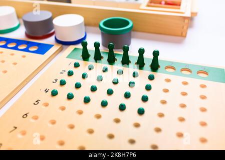 The division board in montessori is a mathematical material to learn in ...