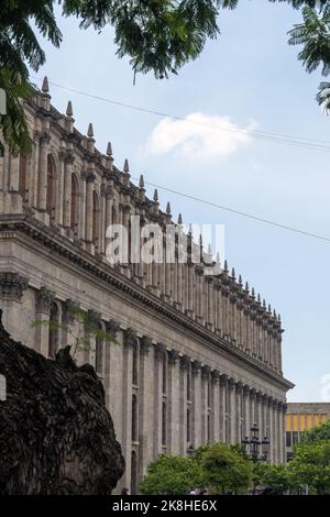 colonial architecture, arches surrounded by vegetation, play of light ...