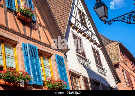 Riquewihr alsatian architecture at springtime with flowers, Eastern ...