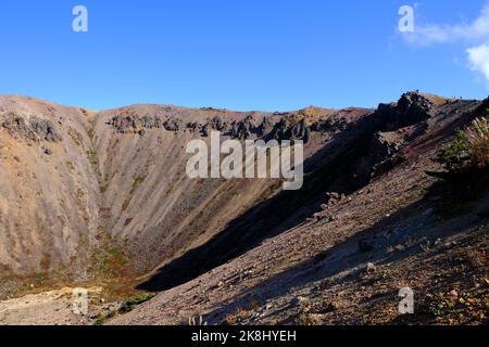 Slopes inside the caldera at Mt. Azuma-Kofuji, an active volcano. Steam ...