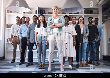 Doing great things together. a group of unrecognizable businesspeople ...