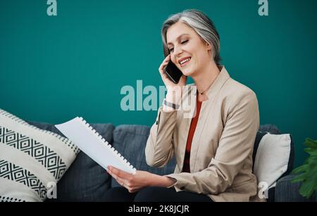 Everything seems to be in order. a confident mature male doctor ...