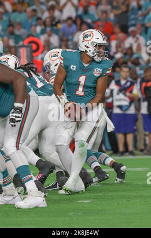 Miami Dolphins' Tua Tagovailoa throws during the second half of an NFL football game against the ...