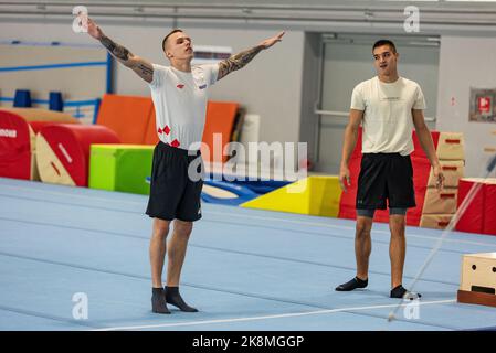 Croatian gymnast Aurel Benovic show his skills before the press ...