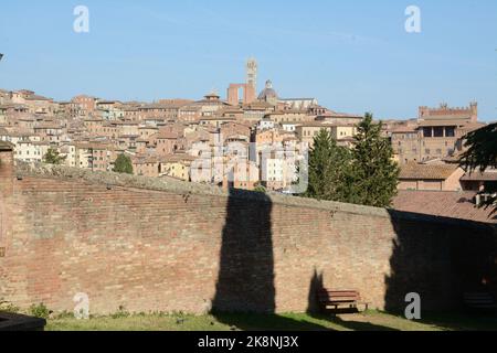 Panorama of Siena with the red houses, the cathedral in Italian ...