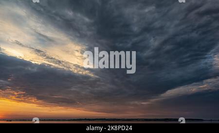 A view of faro island with dramatic sky sunset as veiwed from ...