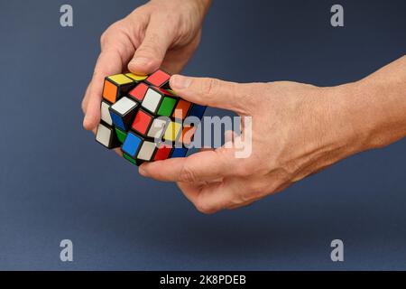 ISTANBUL - TURKEY - OCTOBER 3, 2022: Rubik's cube in man hands, closeup ...