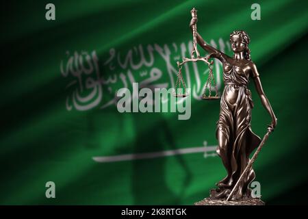 Saudi Arabia flag with statue of lady justice and judicial scales in ...