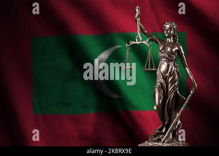 Maldives flag with statue of lady justice, constitution and judge ...