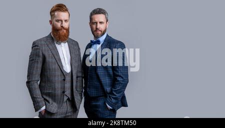 studio shot of gentlemen wearing tux, copy space. elegant gentlemen in ...