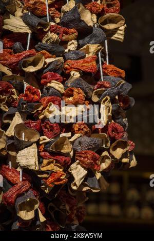 Bundles of dry vegetables dried in the sun Stock Photo - Alamy